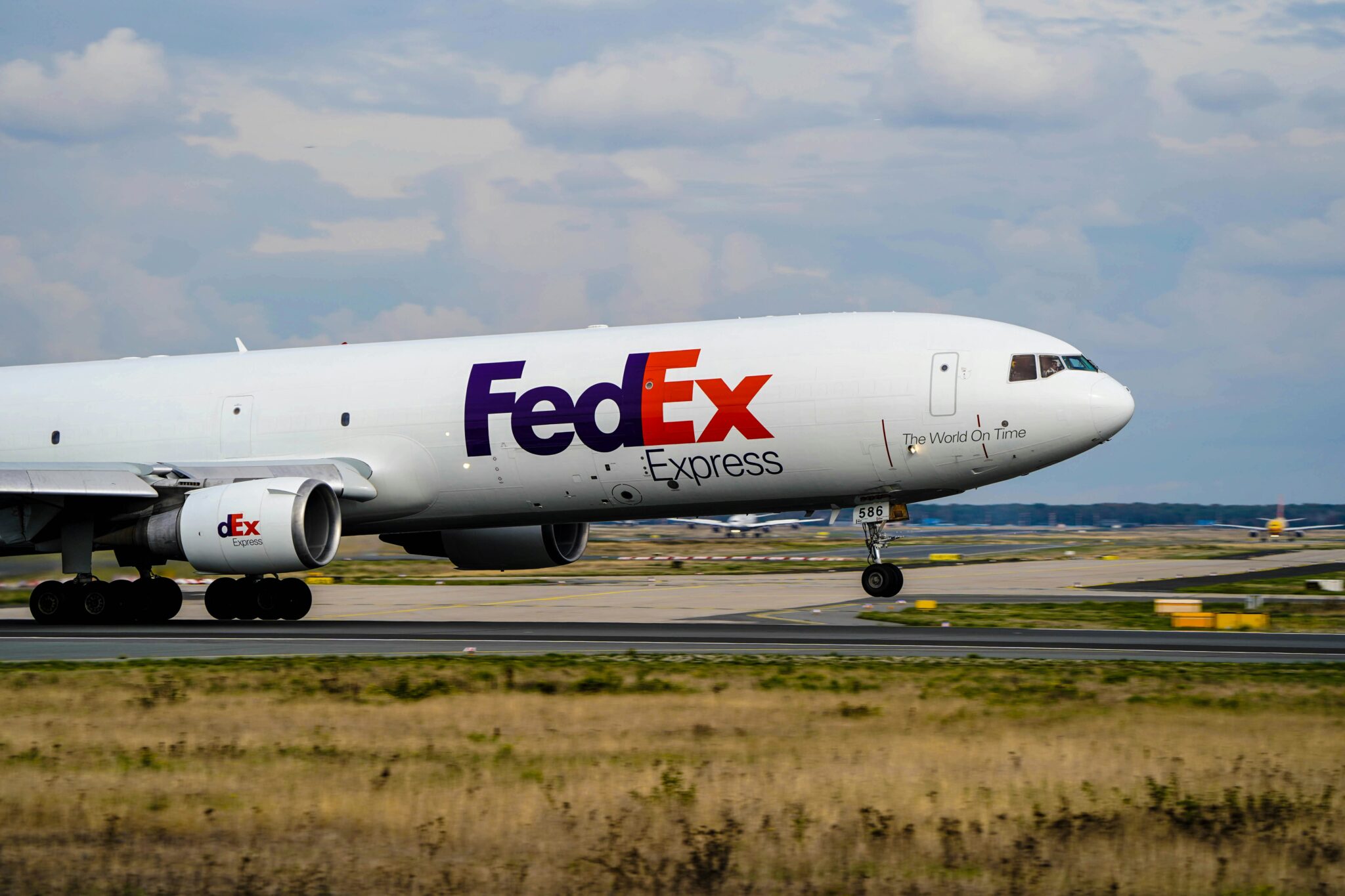 FedEx Logo: Meaning, History, Design Influences, and Evolution - Boon ...