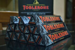 Toblerone Logo: Meaning, History, Design Influences, and Evolution ...
