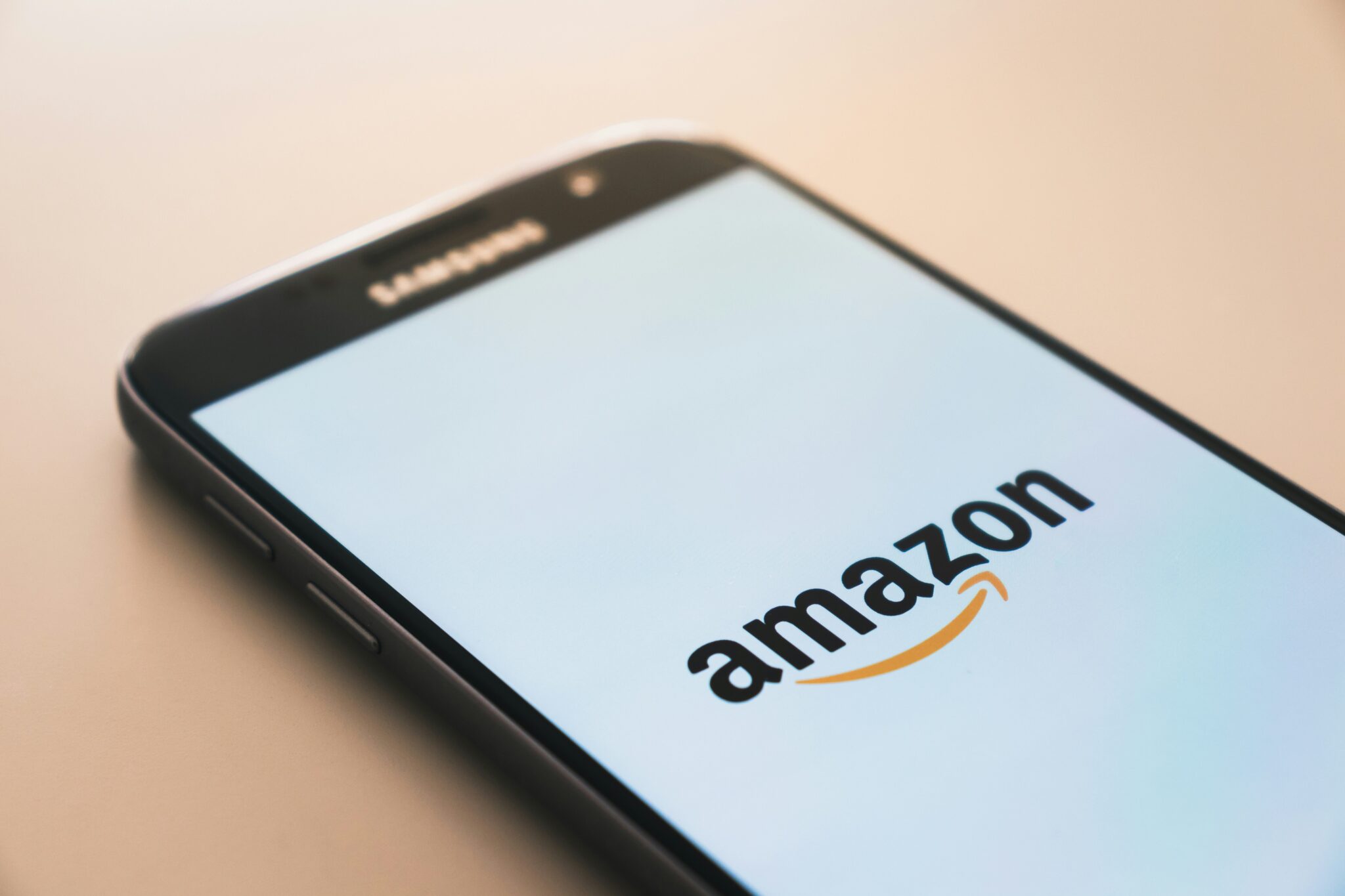 Amazon Logo: Meaning, History, Design Influences, and Evolution - Boon ...