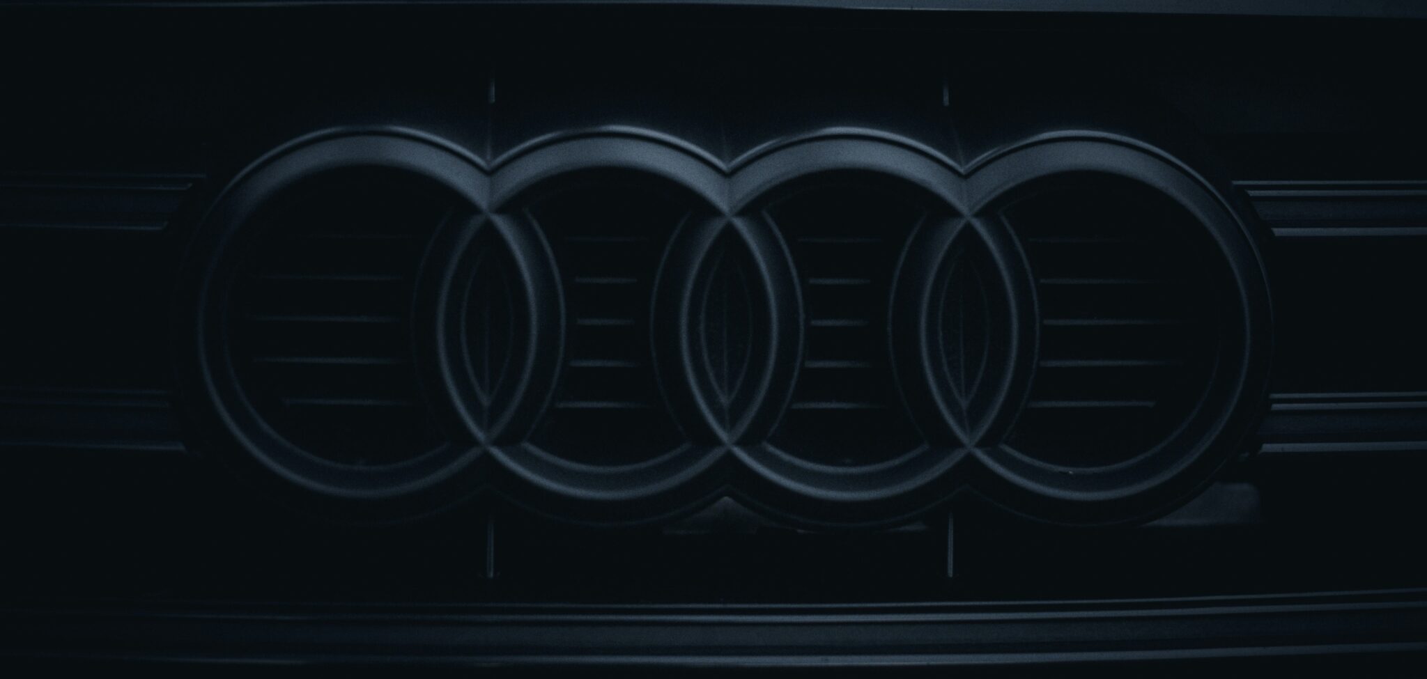 Audi Logo: Meaning, History, Design Influences, and Evolution - Boon ...