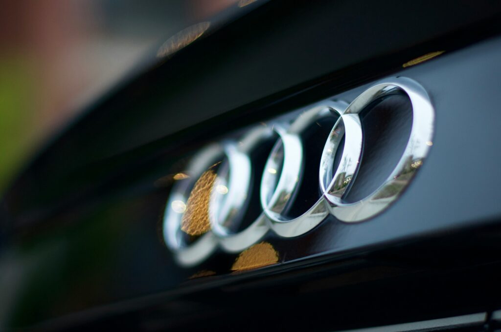 Audi Logo: Meaning, History, Design Influences, and Evolution - Boon ...