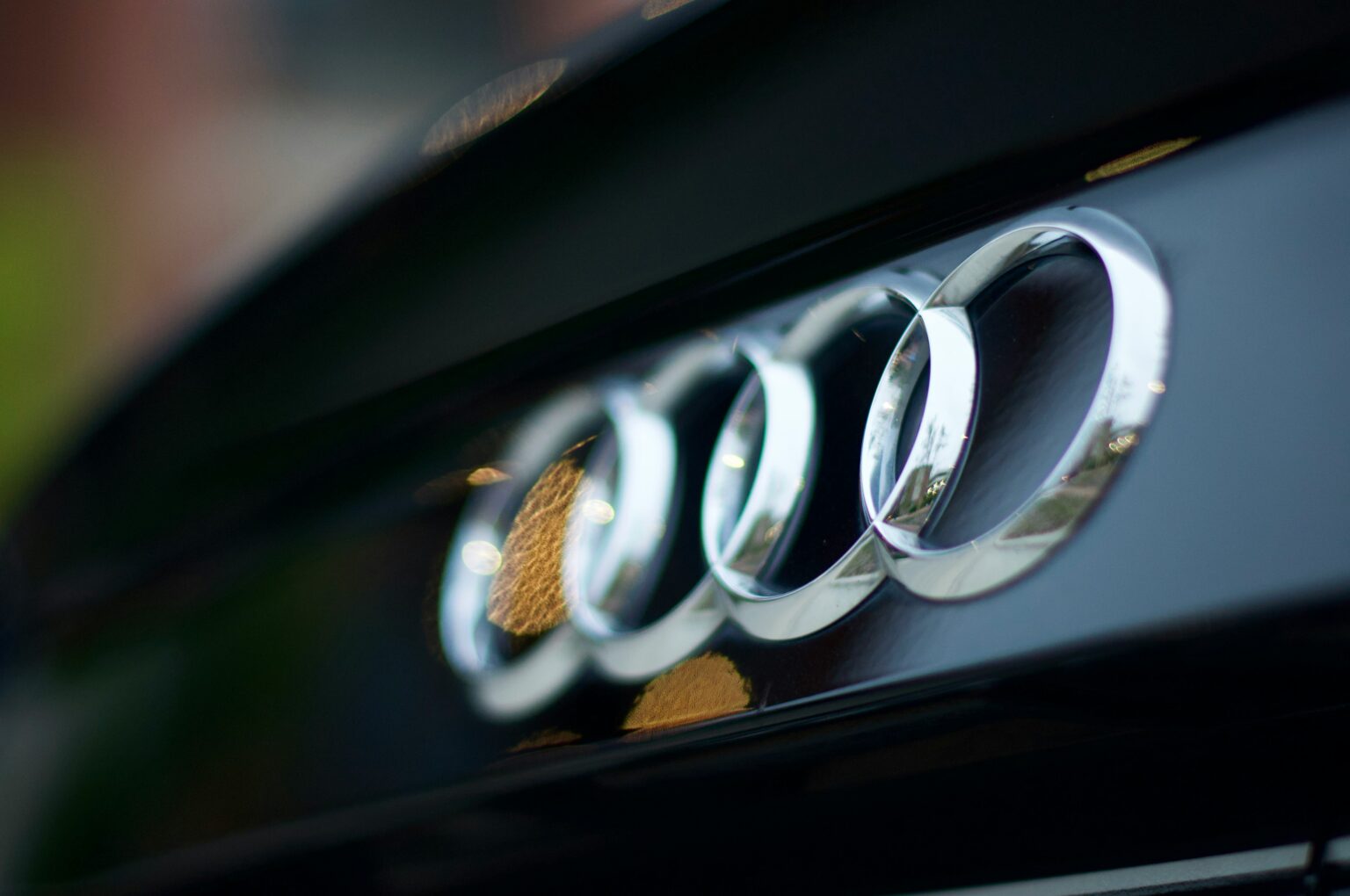 Audi Logo: Meaning, History, Design Influences, and Evolution - Boon ...
