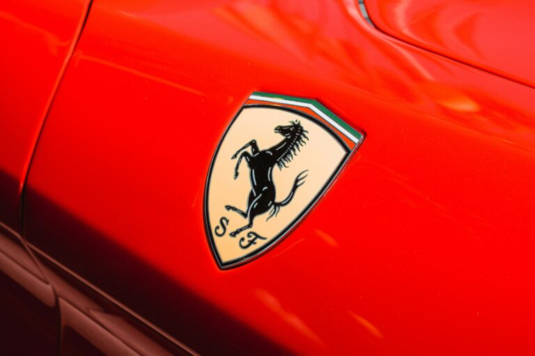 Ferrari Logo: Meaning, History, Design Influences, and Evolution - Boon ...
