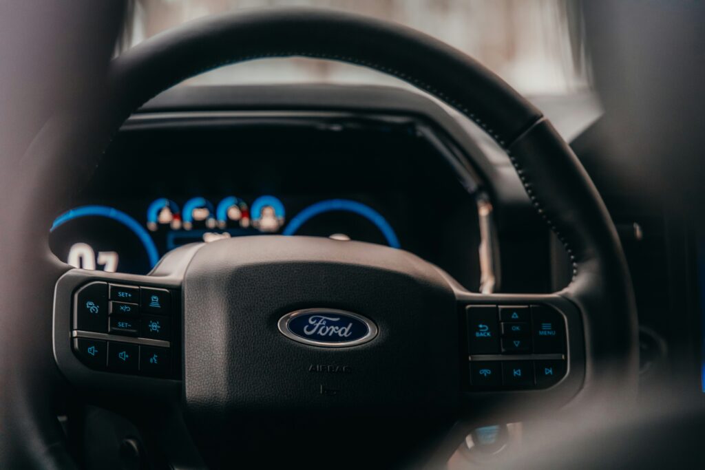 Ford Logo: Meaning, History, Design Influences, and Evolution - Boon ...