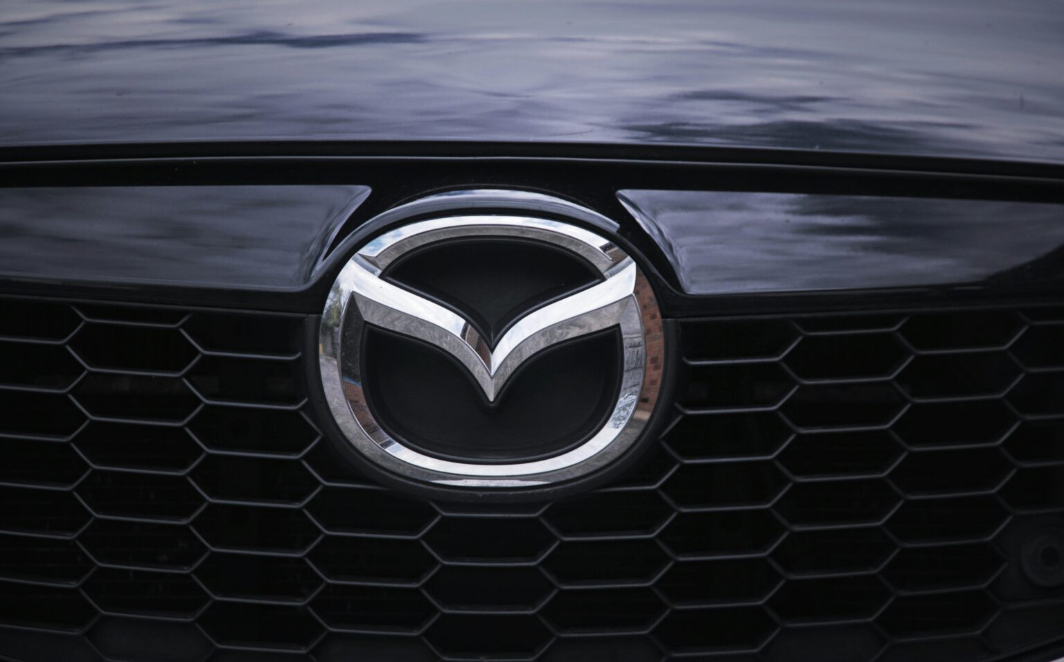 Mazda Logo: Meaning, History, Design Influences, and Evolution - Boon ...