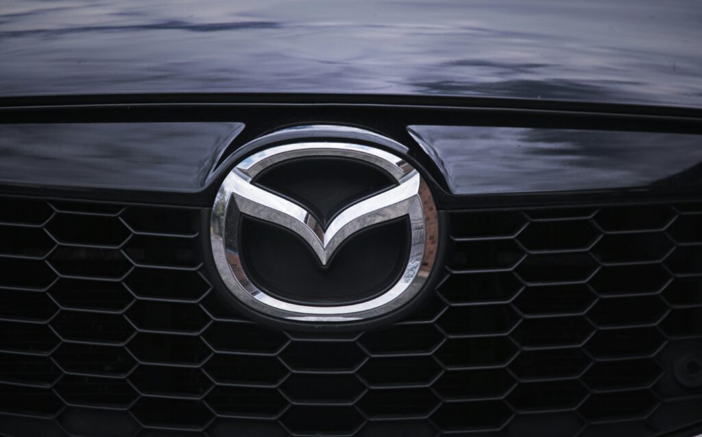 Mazda Logo: Meaning, History, Design Influences, and Evolution - Boon ...