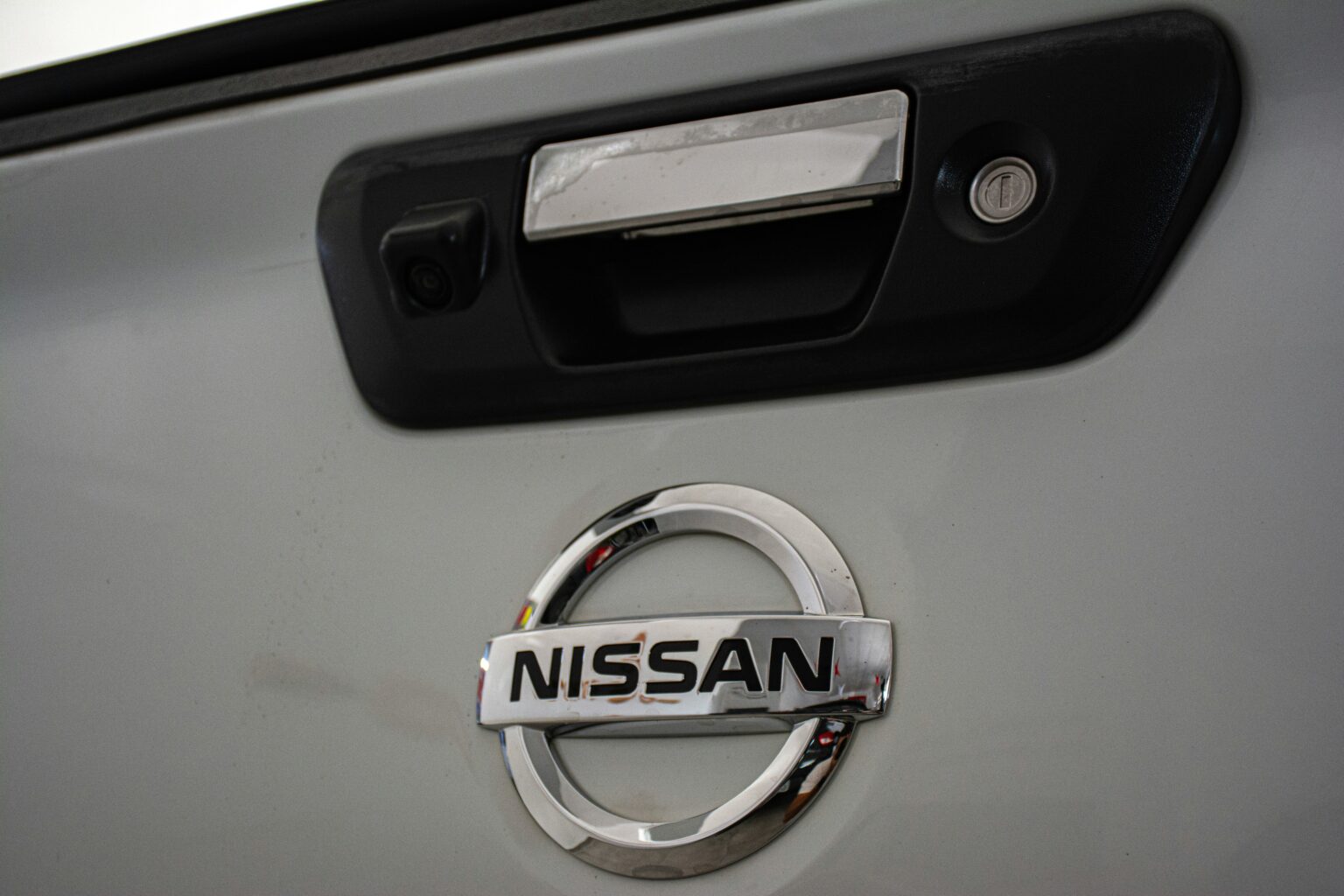 Nissan Logo: Meaning, History, Design Influences, and Evolution - Boon ...