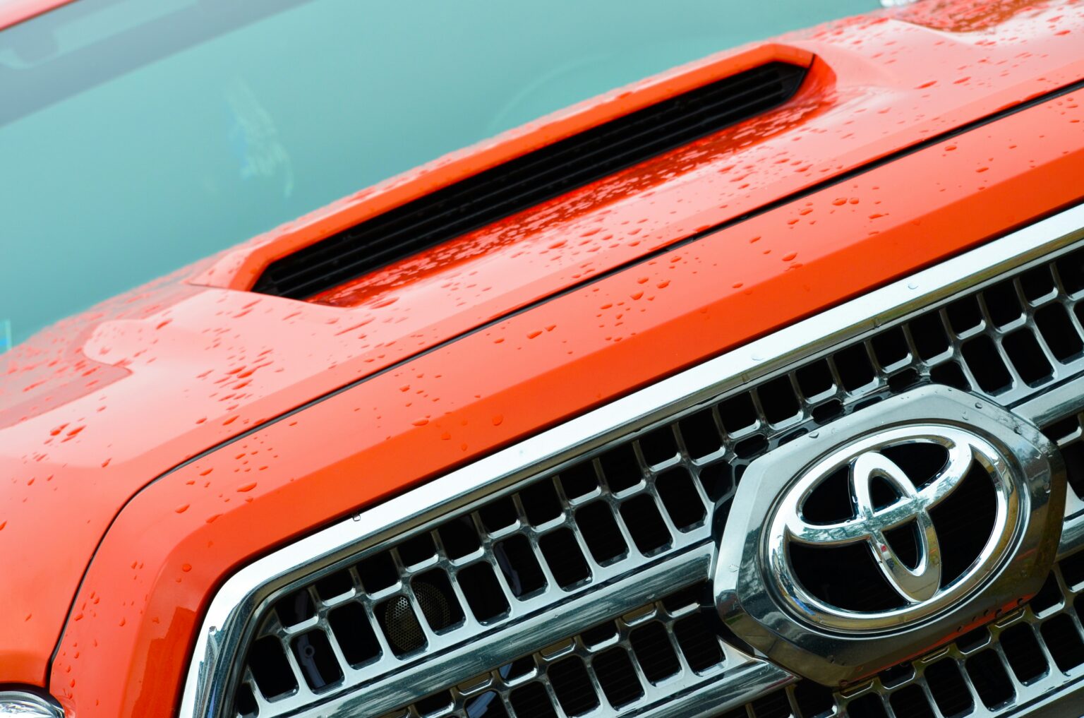 Toyota Logo: Meaning, History, Design Influences, and Evolution - Boon ...