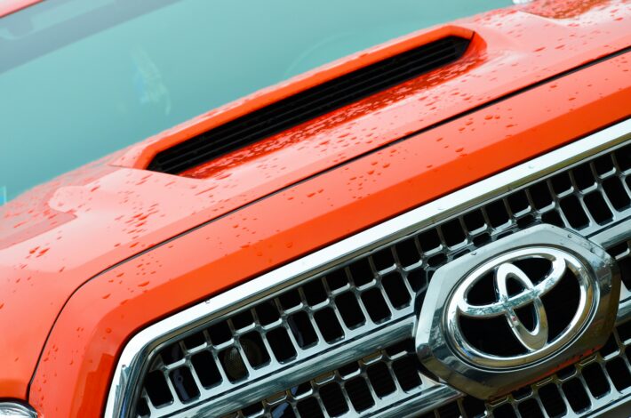 Toyota Logo: Meaning, History, Design Influences, and Evolution - Boon ...